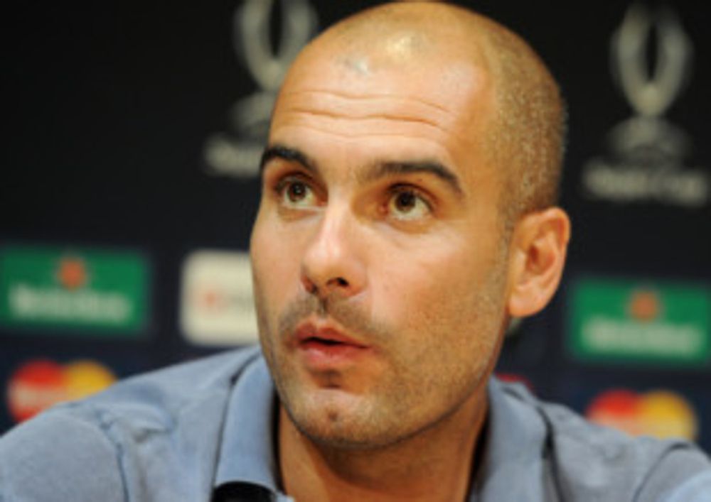 Guardiola tells players to aim high