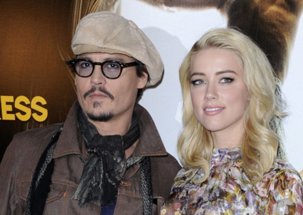 Johnny and Amber engaged: report