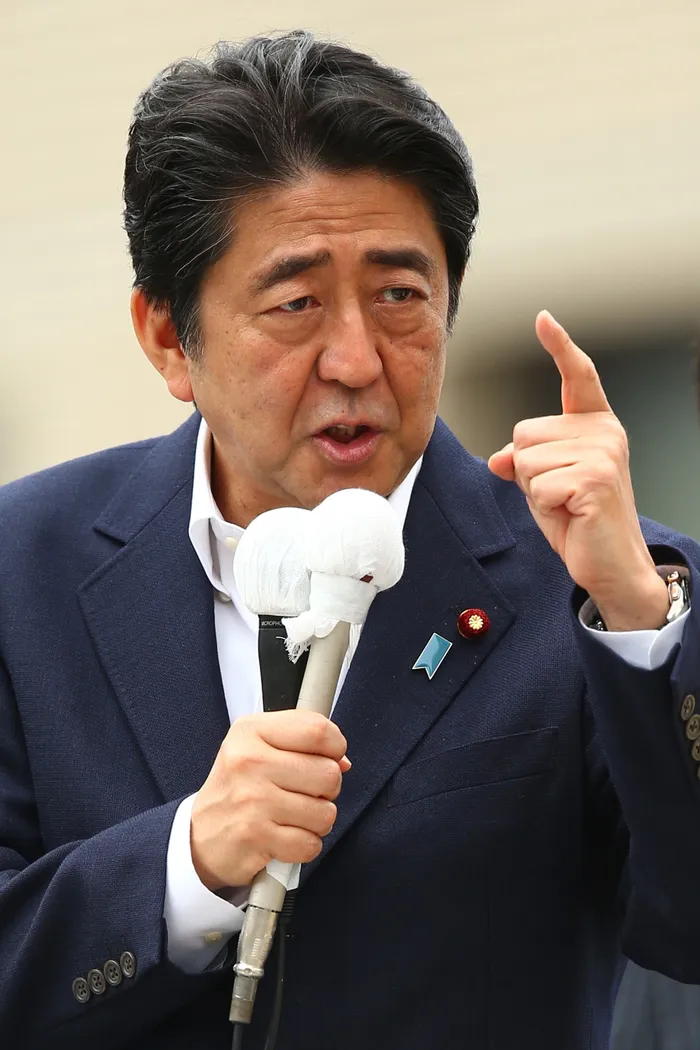 Abe killer wielded homemade gun and had grudge over mother's bankruptcy ...