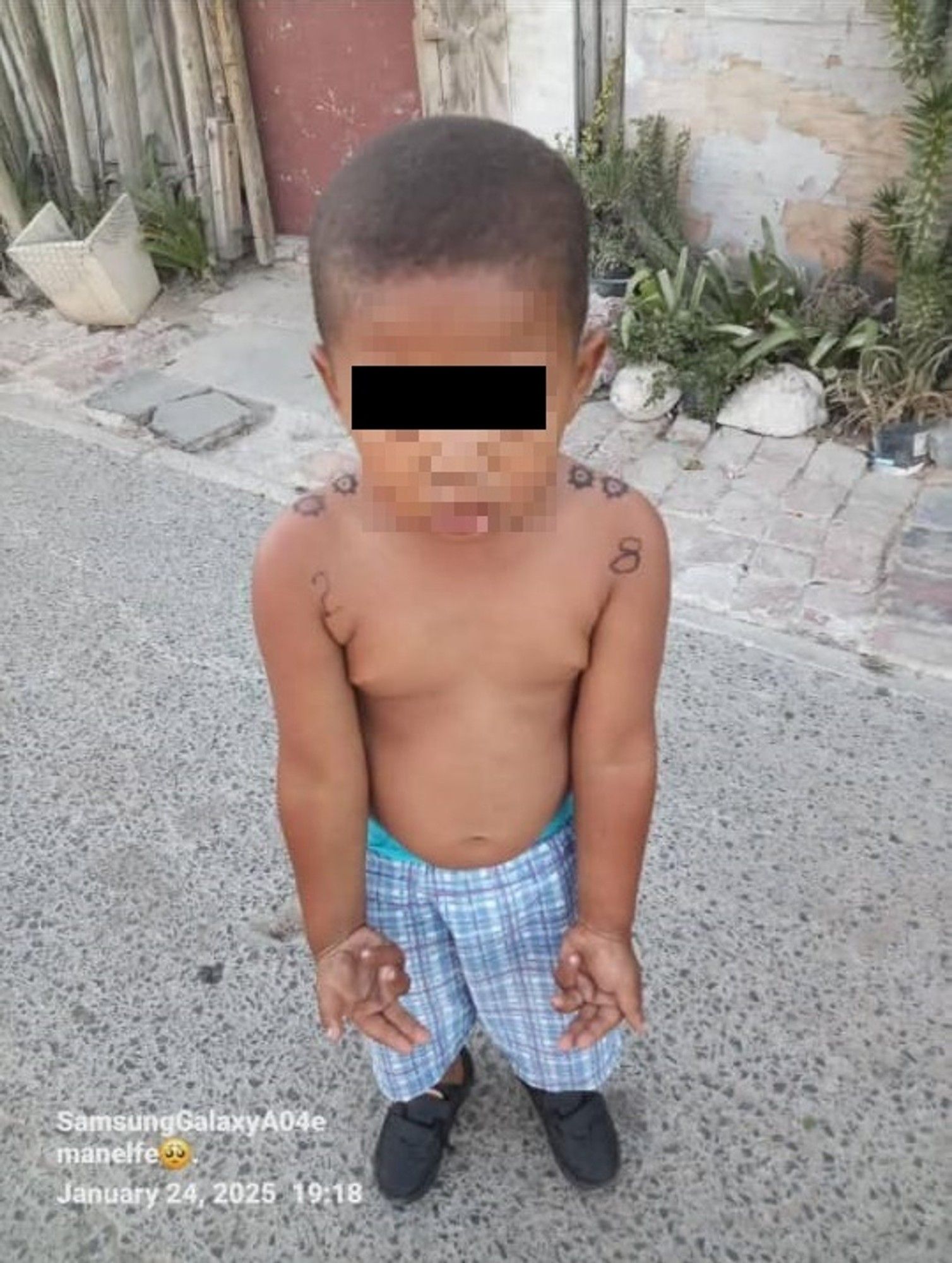 Outrage as toddler displays gang tattoos in social media post