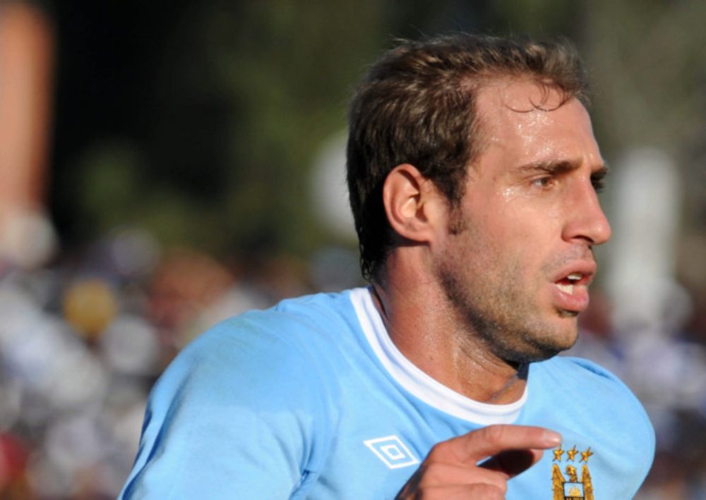 Zabaletta, Johnson sign new deals