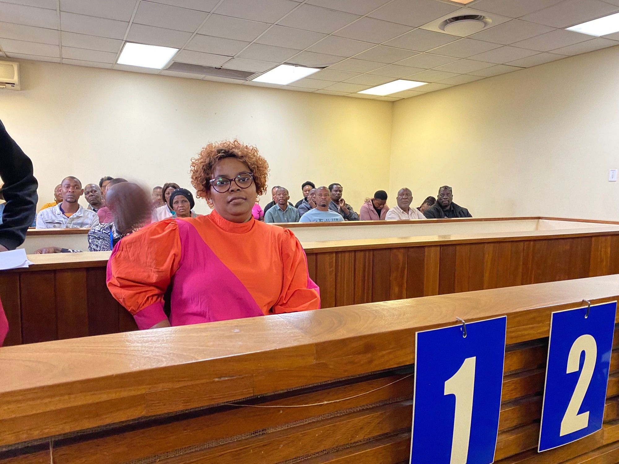 Two alleged killer wives in court with accomplices