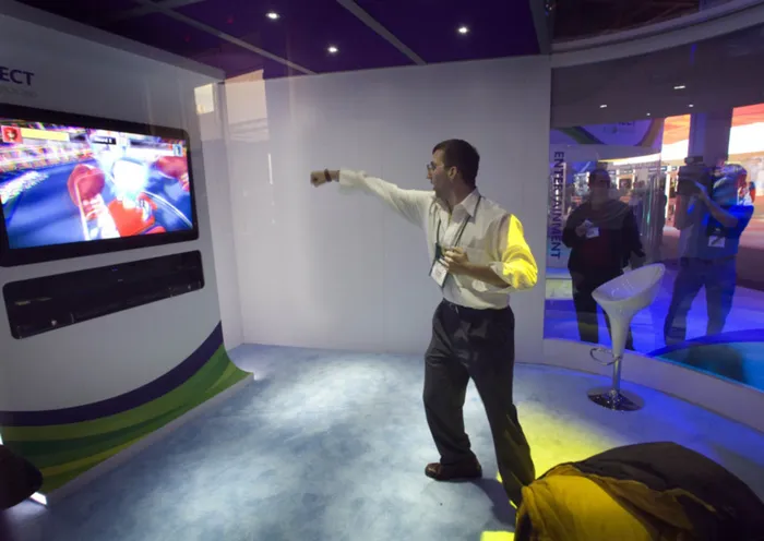Microsoft expands Kinect into media hub