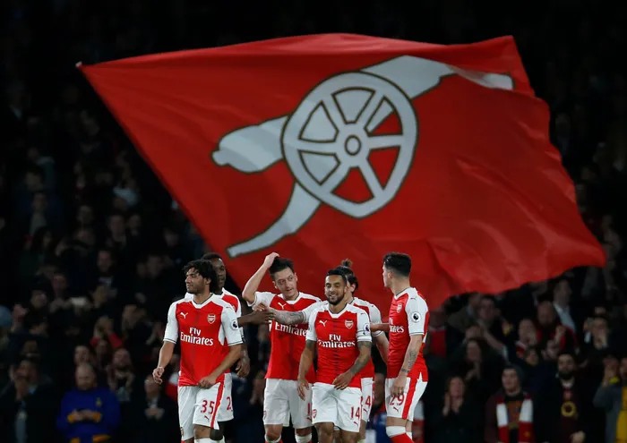 Arsenal go above United in three-goal hammering