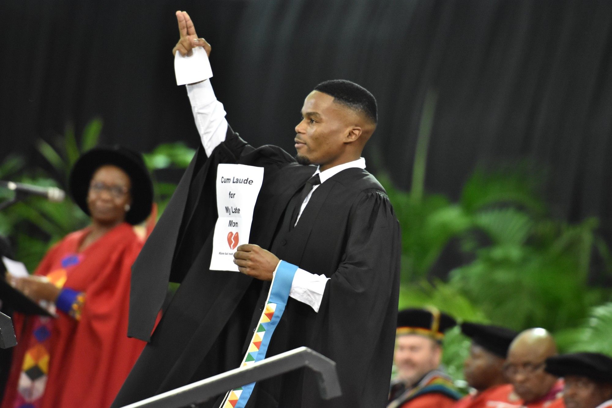 Two cum laude graduates remember their late mothers during graduation