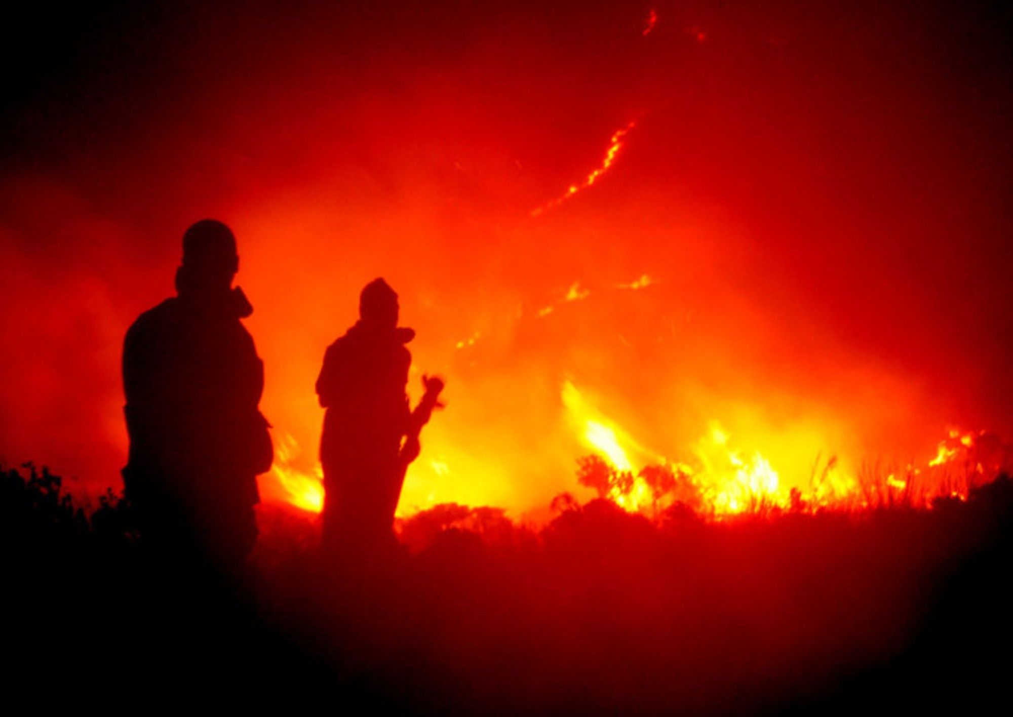 Woman critical after escaping fire