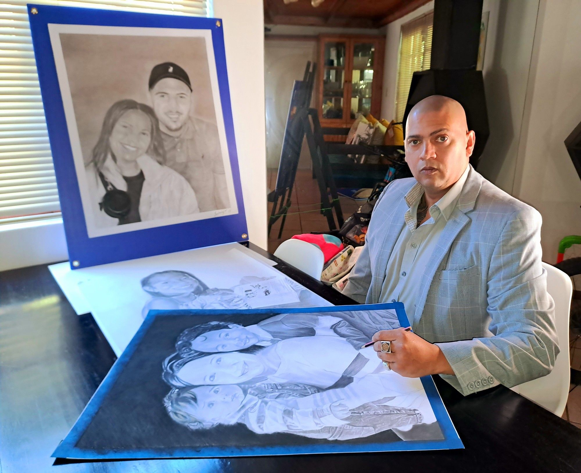 Artist aims to share his portraiture with the public