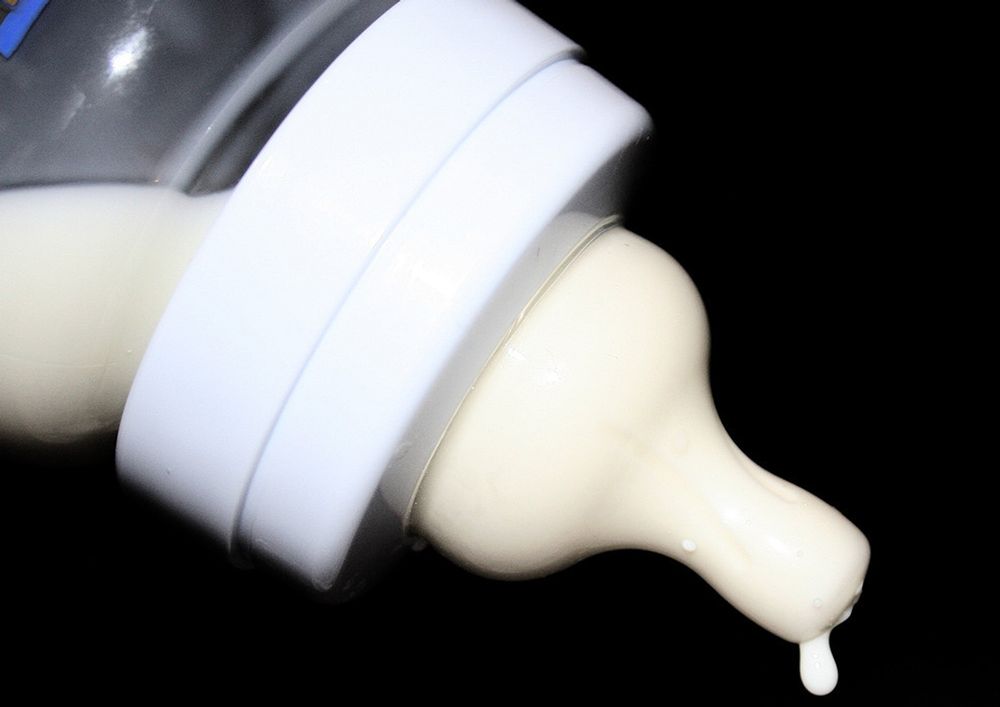Priest held for baby milk 'scam'
