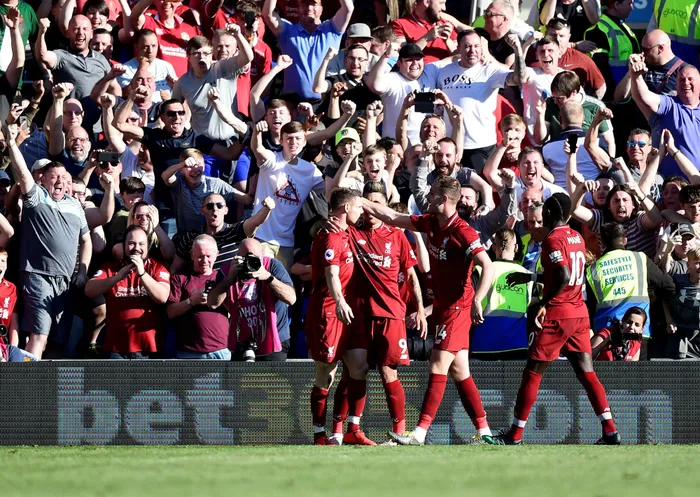 Liverpool back on top with win at Cardiff
