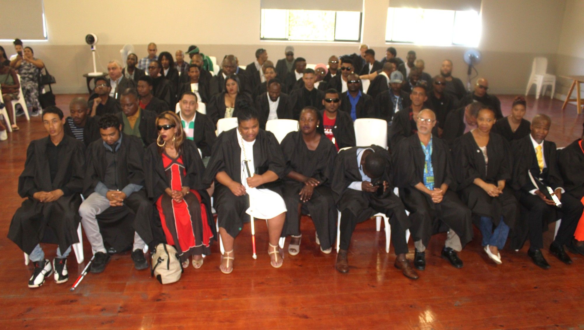 Blind shine at graduation ceremony
