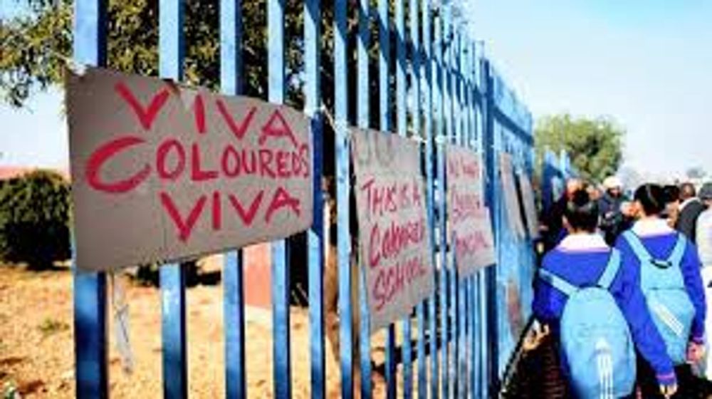 Racial storm over the appointment of a black principal rages on