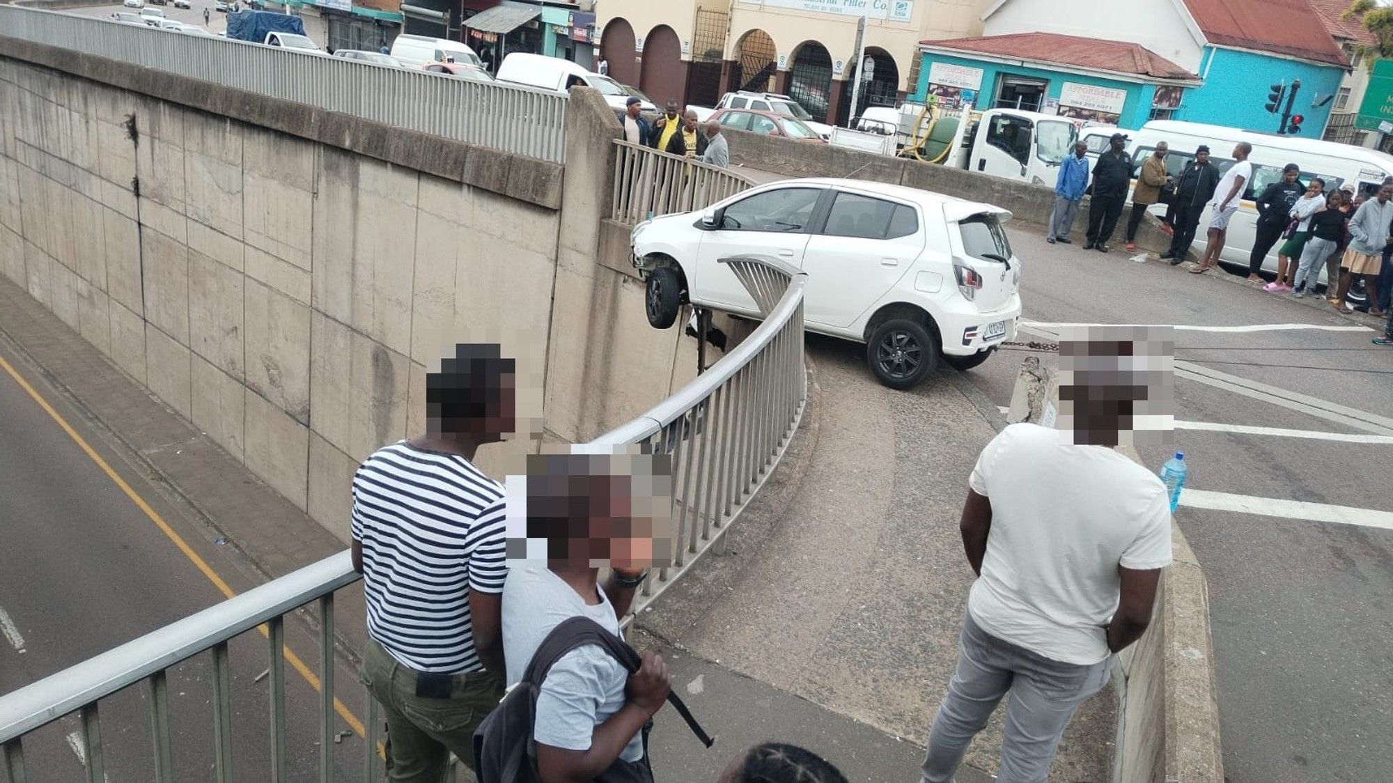 PICS: Durban driver escapes death after car crashes through barrier and ...