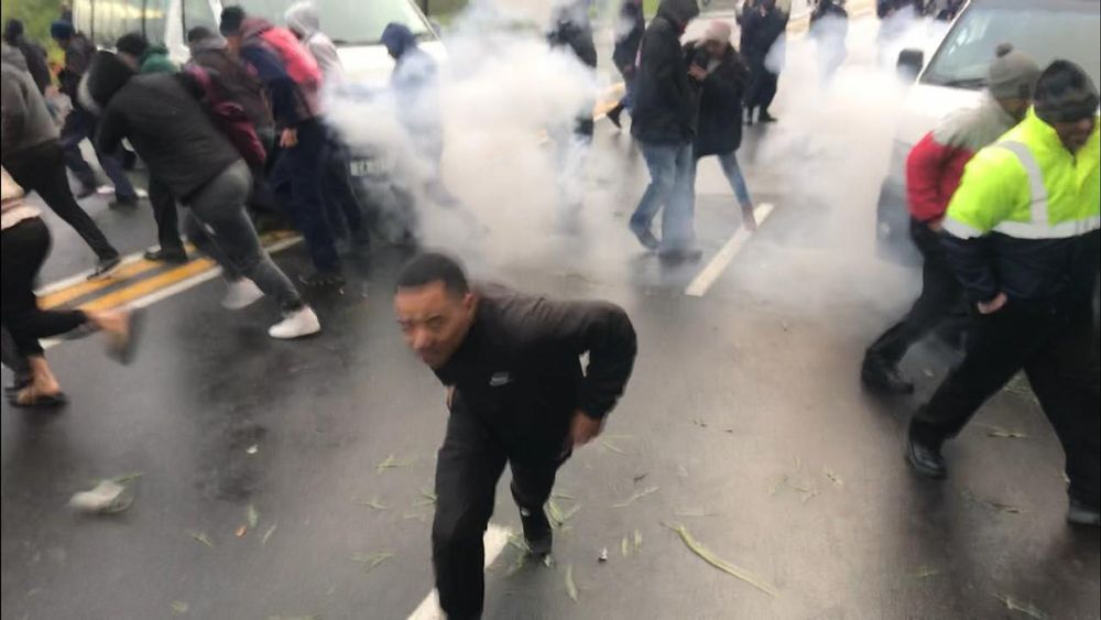 WATCH: Tear gas, stun grenades used to disperse total shutdown ...