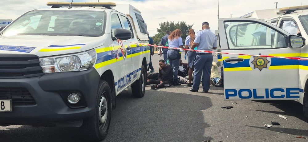 Chaos ensues after accident involving SAPS vehicle and black Toyota in ...