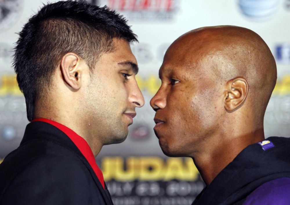 Khan closes in on unification showdown