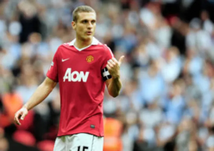 Vidic faces fives weeks out