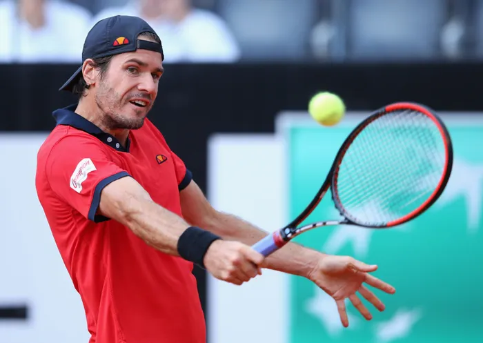 Injured Haas retires in Rome
