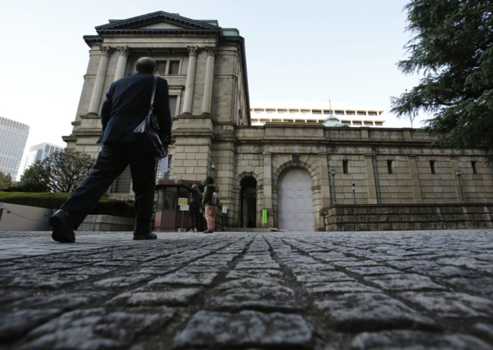 BOJ cuts inflation outlook