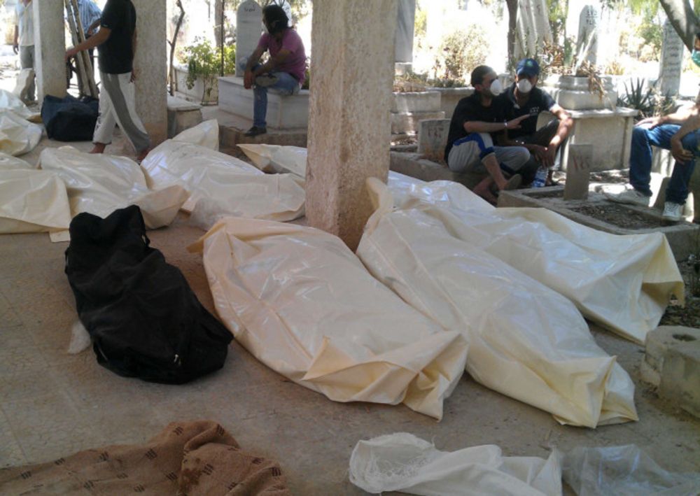 Assad urged to give up power