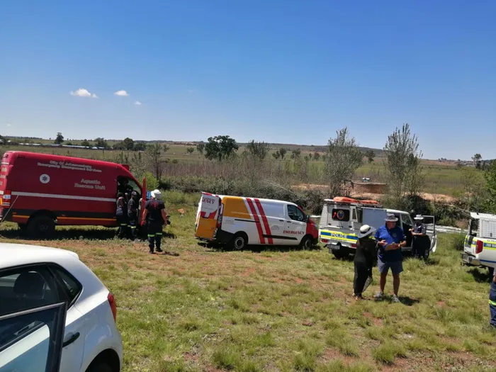 Authorities searching for bodies of two people washed away during a ...