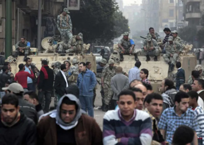 Police fire shots near central Cairo square