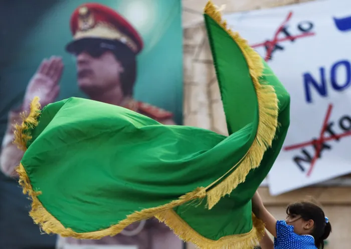 Gaddafi forces retake western village
