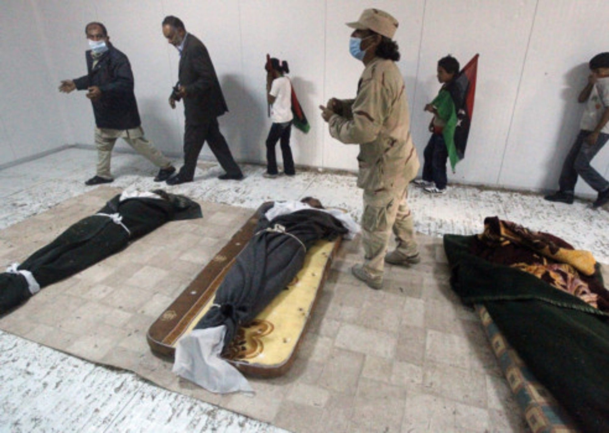 Gaddafi to be buried in secret grave -NTC