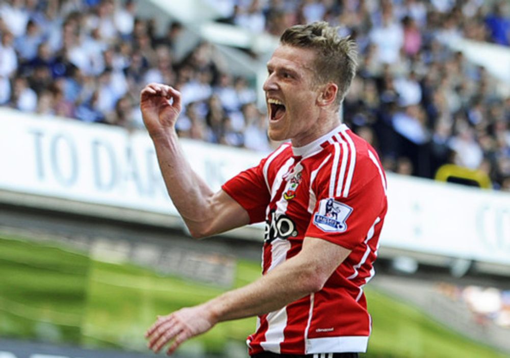 Davis double misery for Spurs