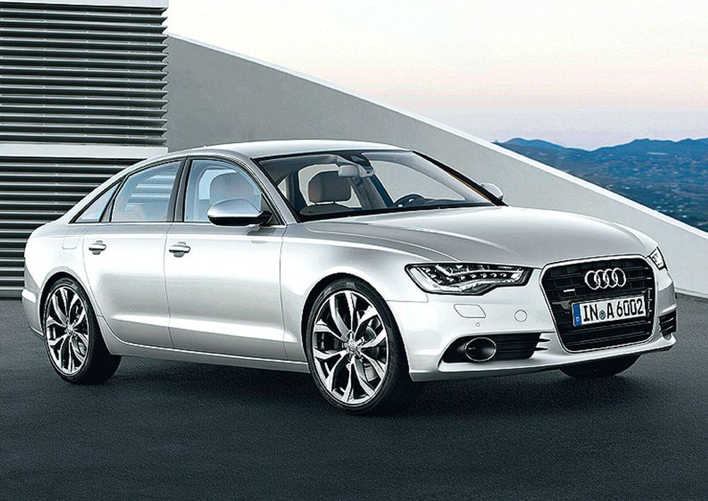 Audi reins in spending