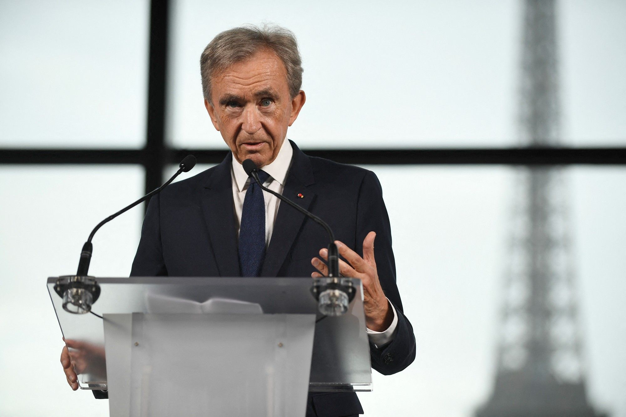 French luxury mogul Arnault defiant at ex-spy chief trial