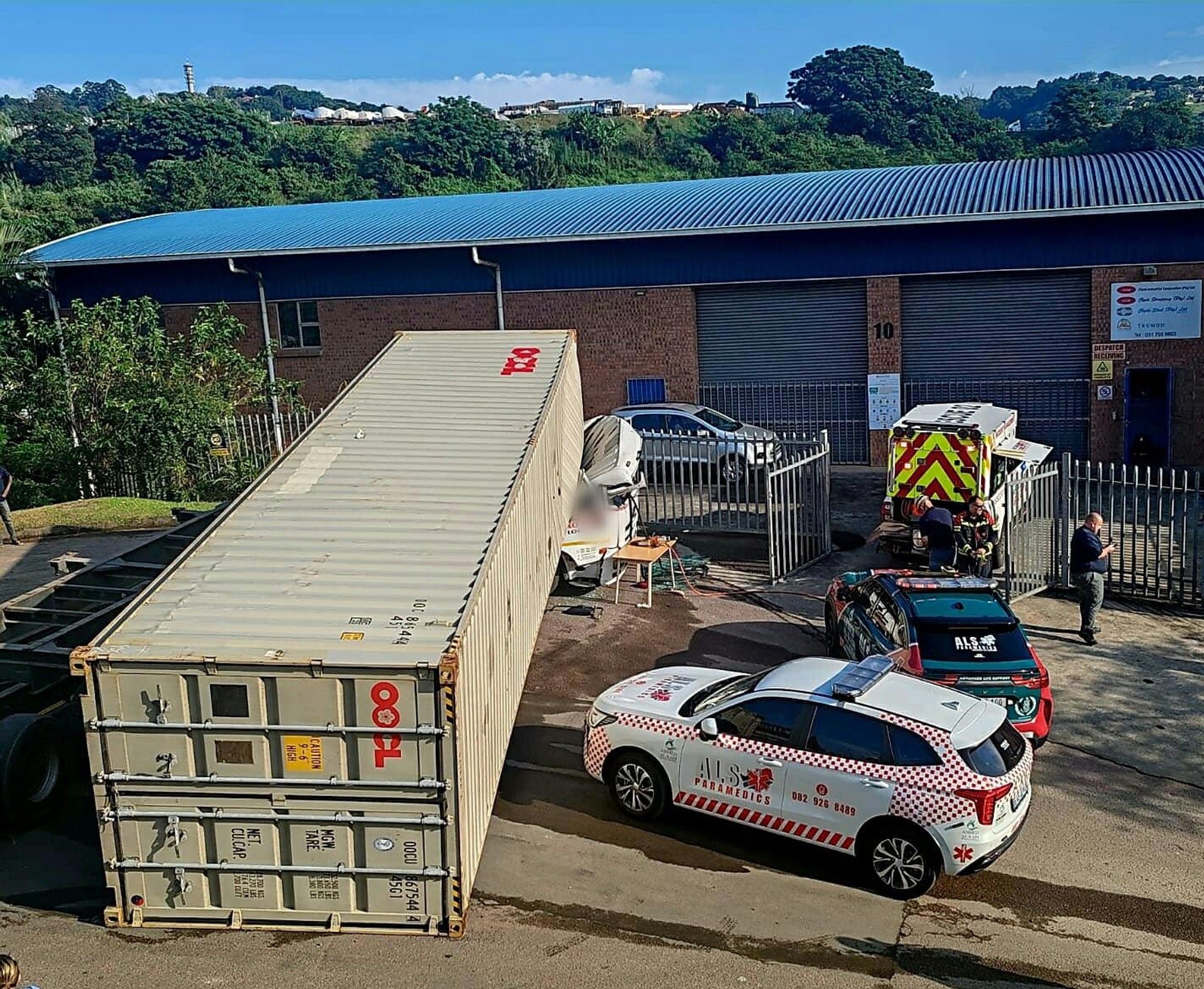 PICS: Durban truck driver crushed to death by 20 tonnes of timber