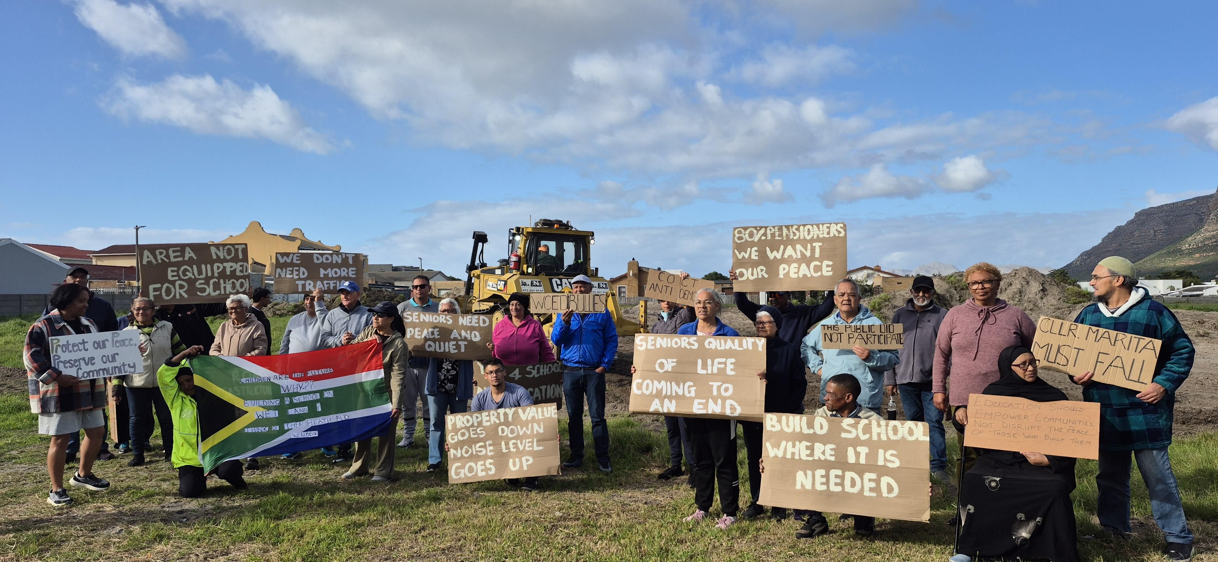 Senior citizens protest against new school construction in Coniston Park