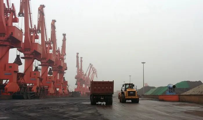 Iron ore prices slump as China places limits on steel production
