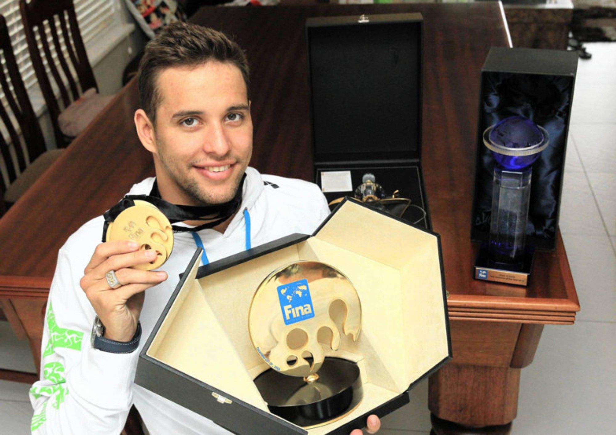 Chad home with a pile of gold