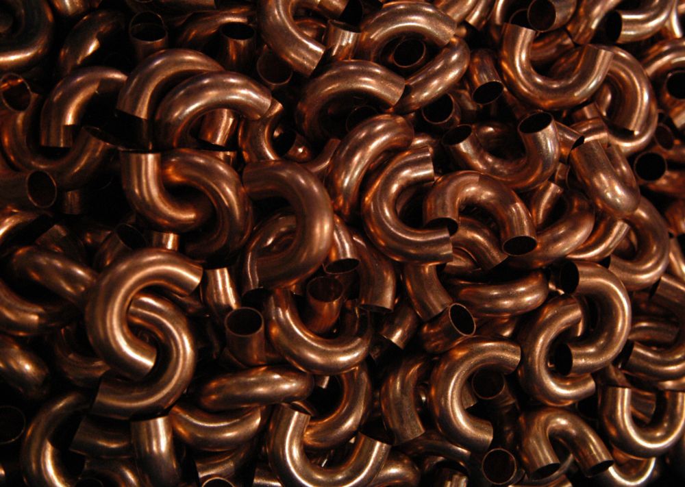 Copper eases on demand concerns