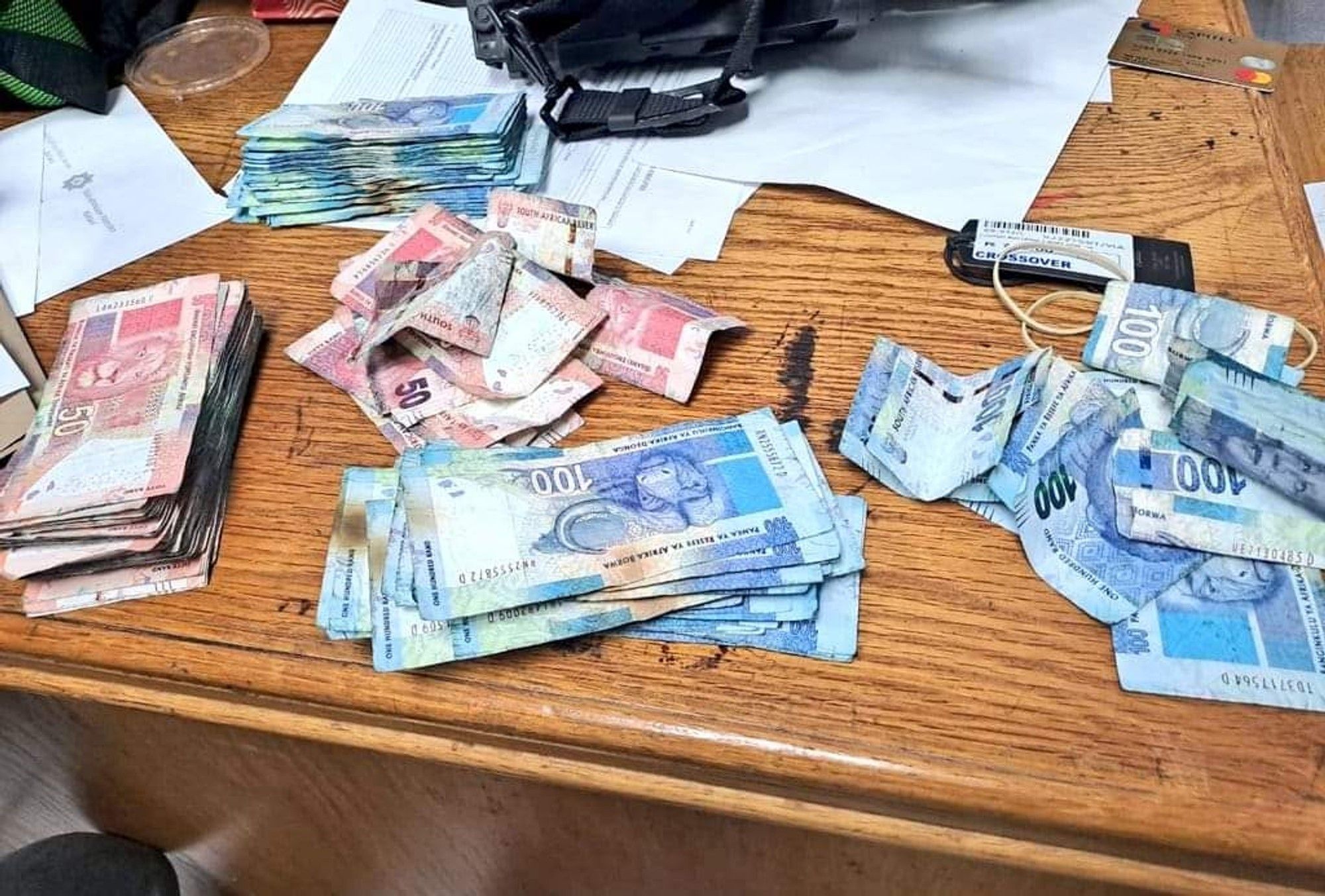 Bags of burnt, stained money recovered as JMPD takes down suspect ...