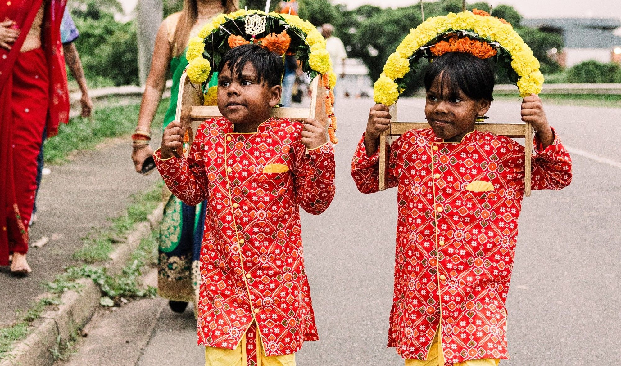 Young twins join family tradition in Thai Poosam Kavady celebration
