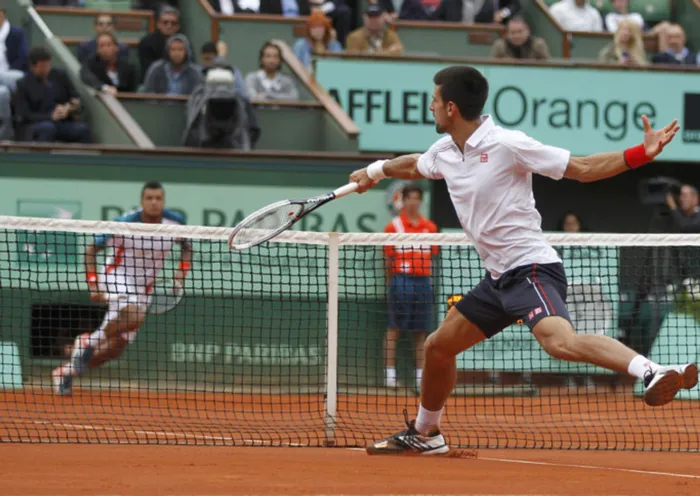 Djokovic digs deep to halt Tsonga