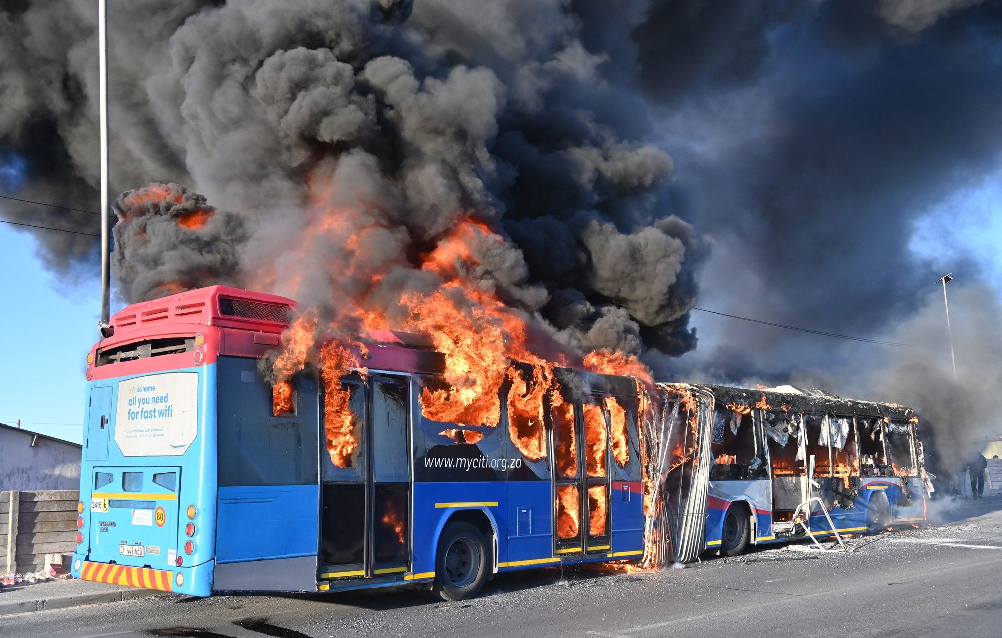 [PICS & VIDEO] Day one of taxi chaos: Buses torched, three arrested in ...