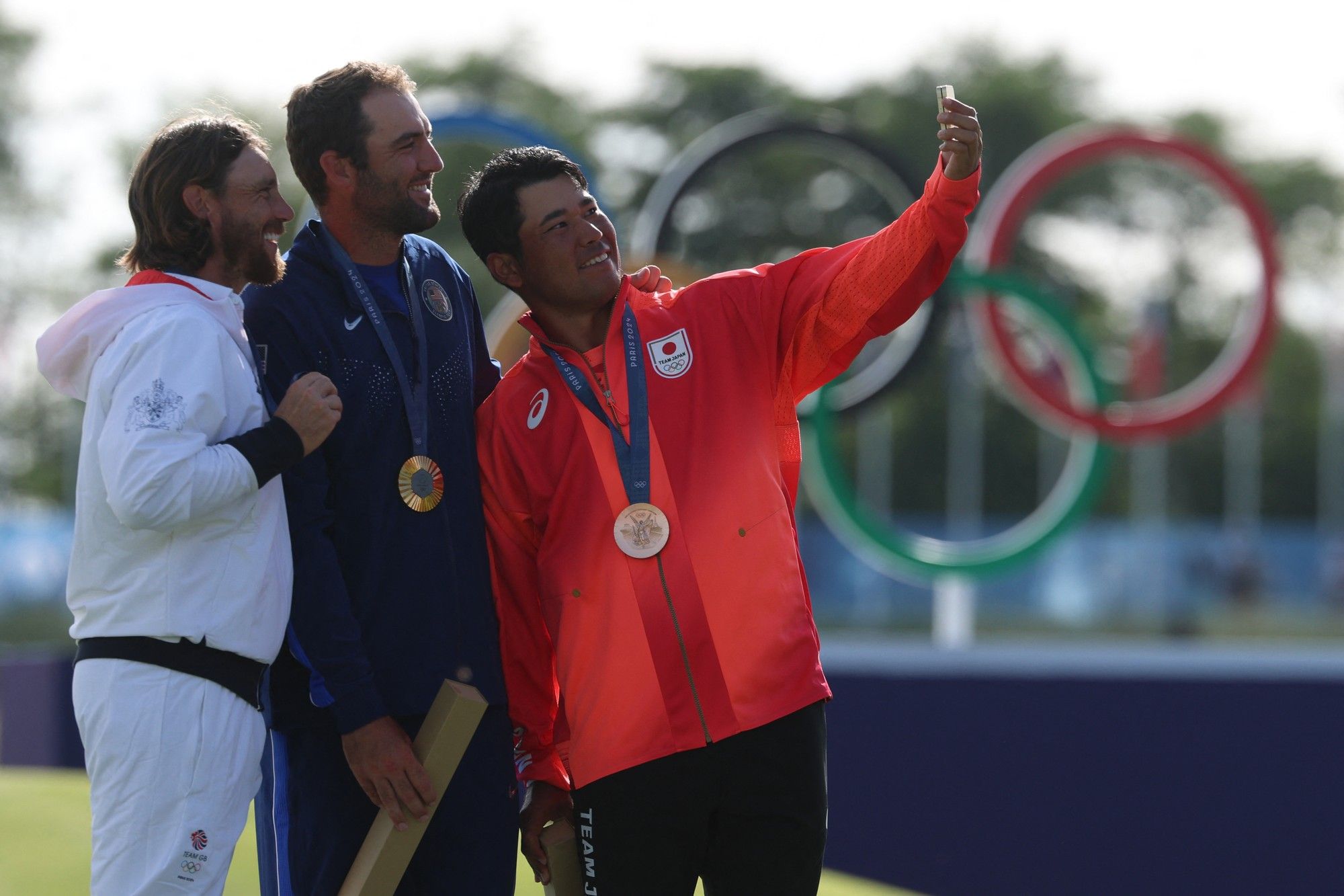 Scottie Scheffler shoots lights out to win golf gold after final round ...