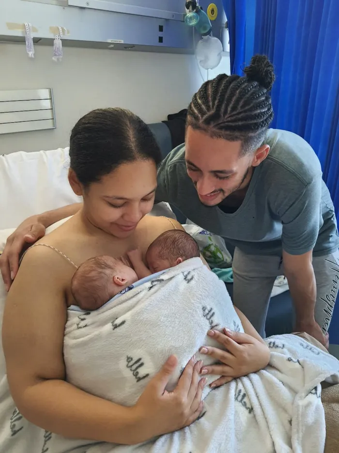 Twins born premature 10 months ago go home for Christmas after cuddles ...