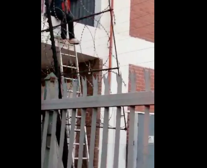 Hero cops prevent man holding a beer from jumping off Pretoria central ...