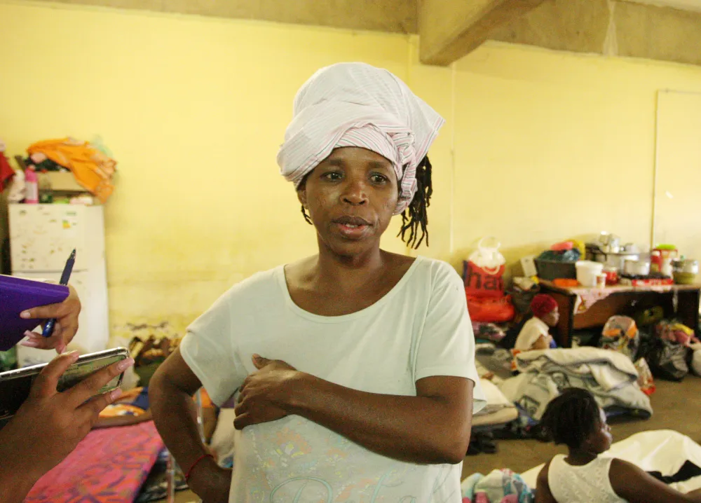 Desperate flood victims evicted from Transnet building outside Durban