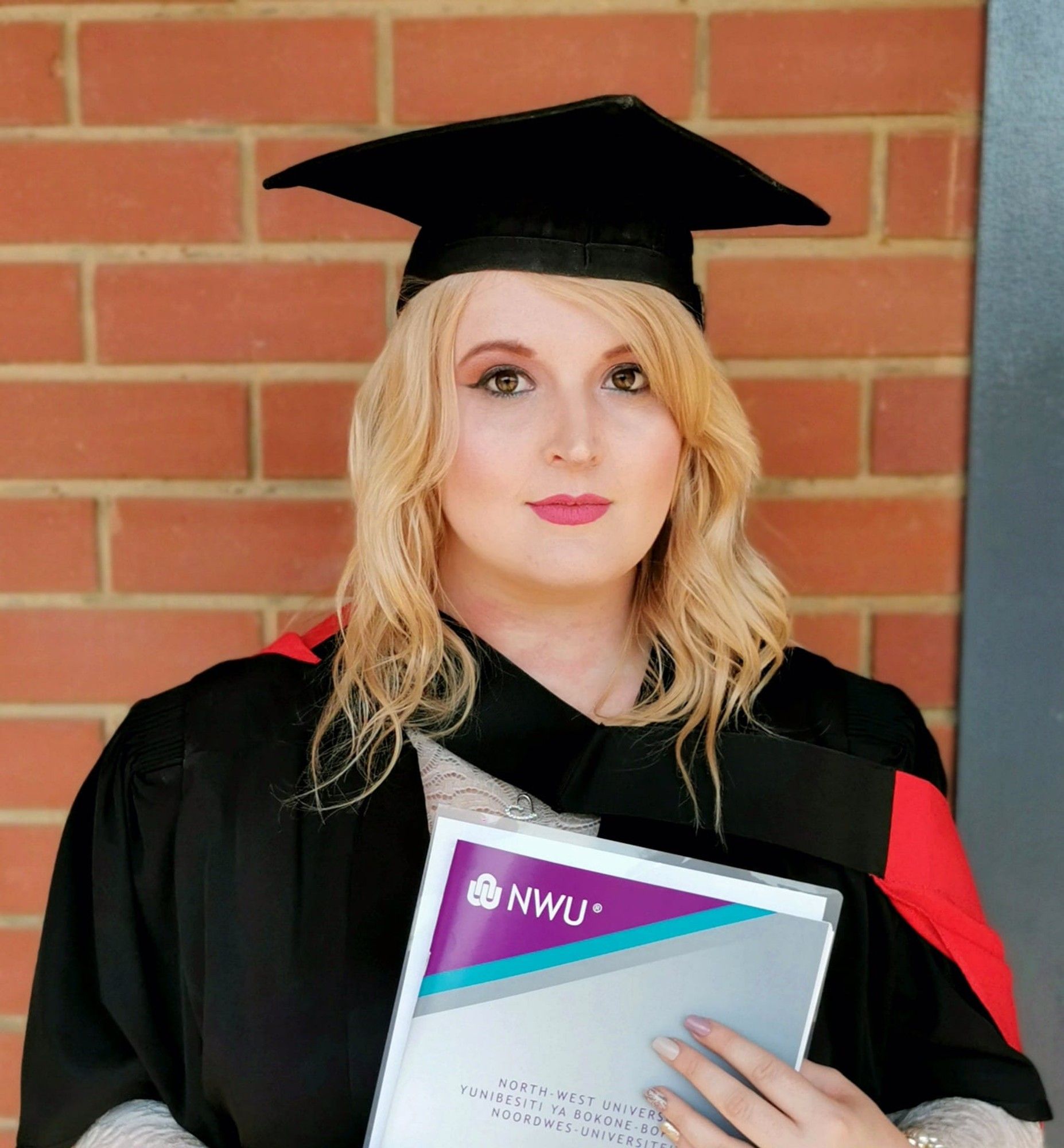 NWU’s youngest PhD law graduate sets academic record