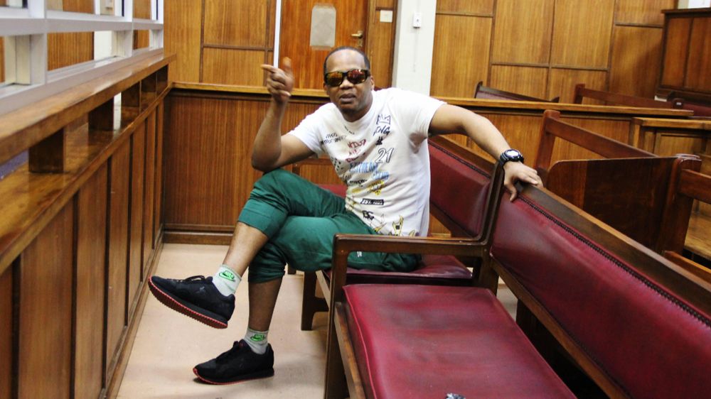 Alleged gang boss fears pox during psychiatric observation