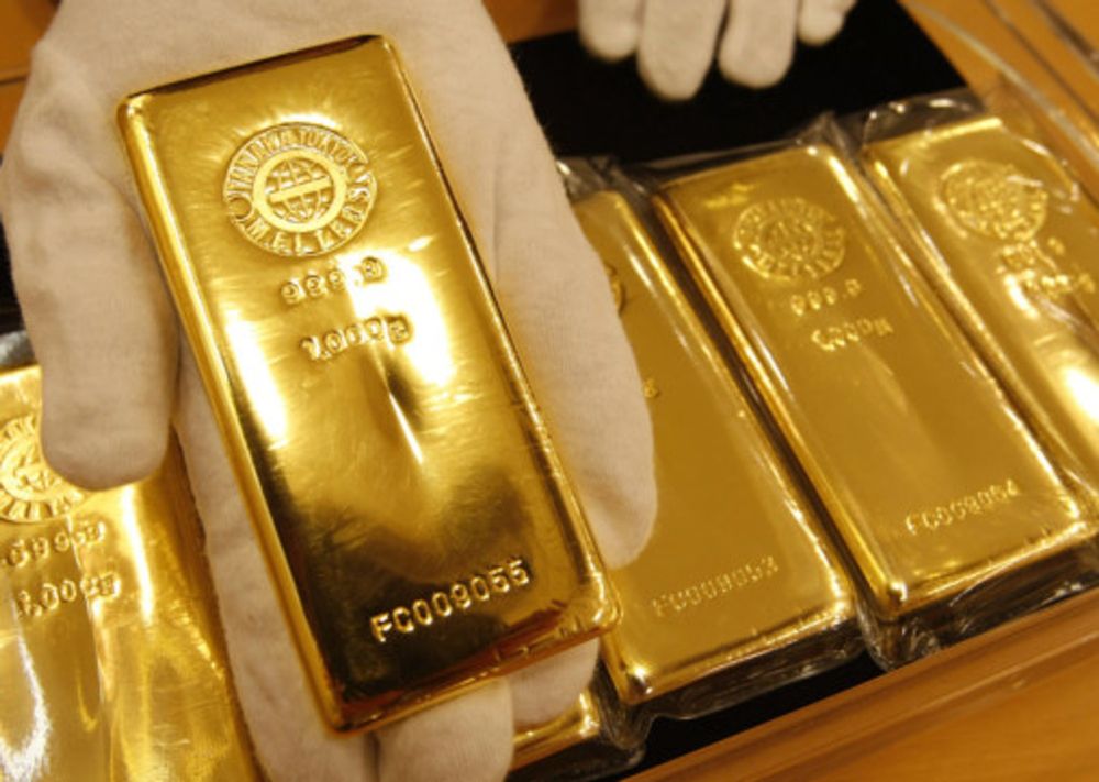 Gold holding near five-month highs