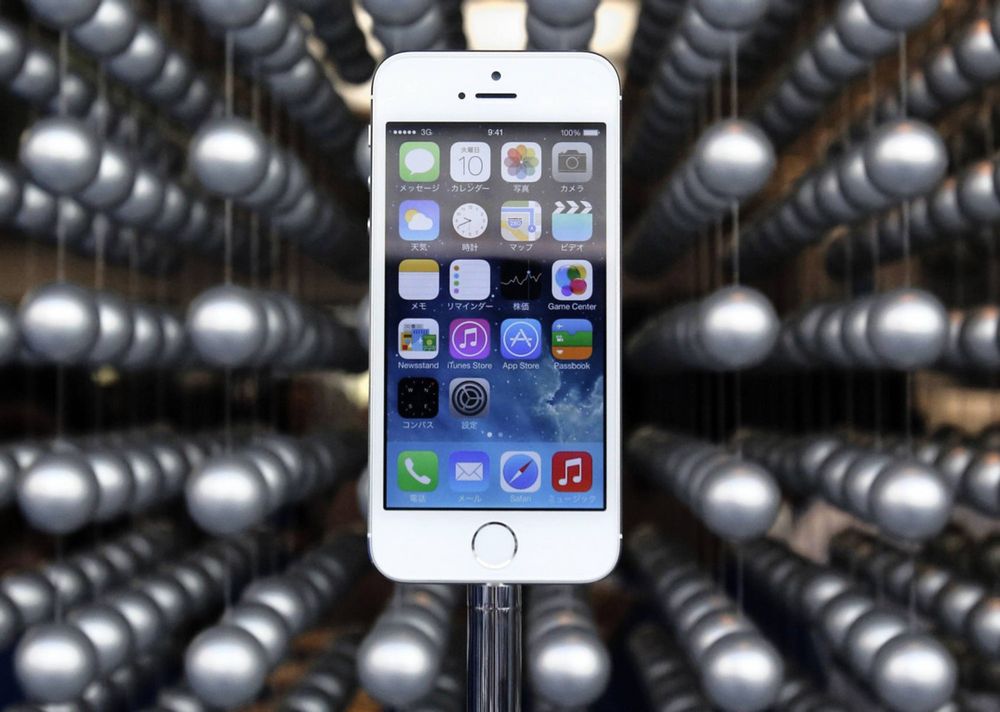 China Mobile says still in talks with Apple