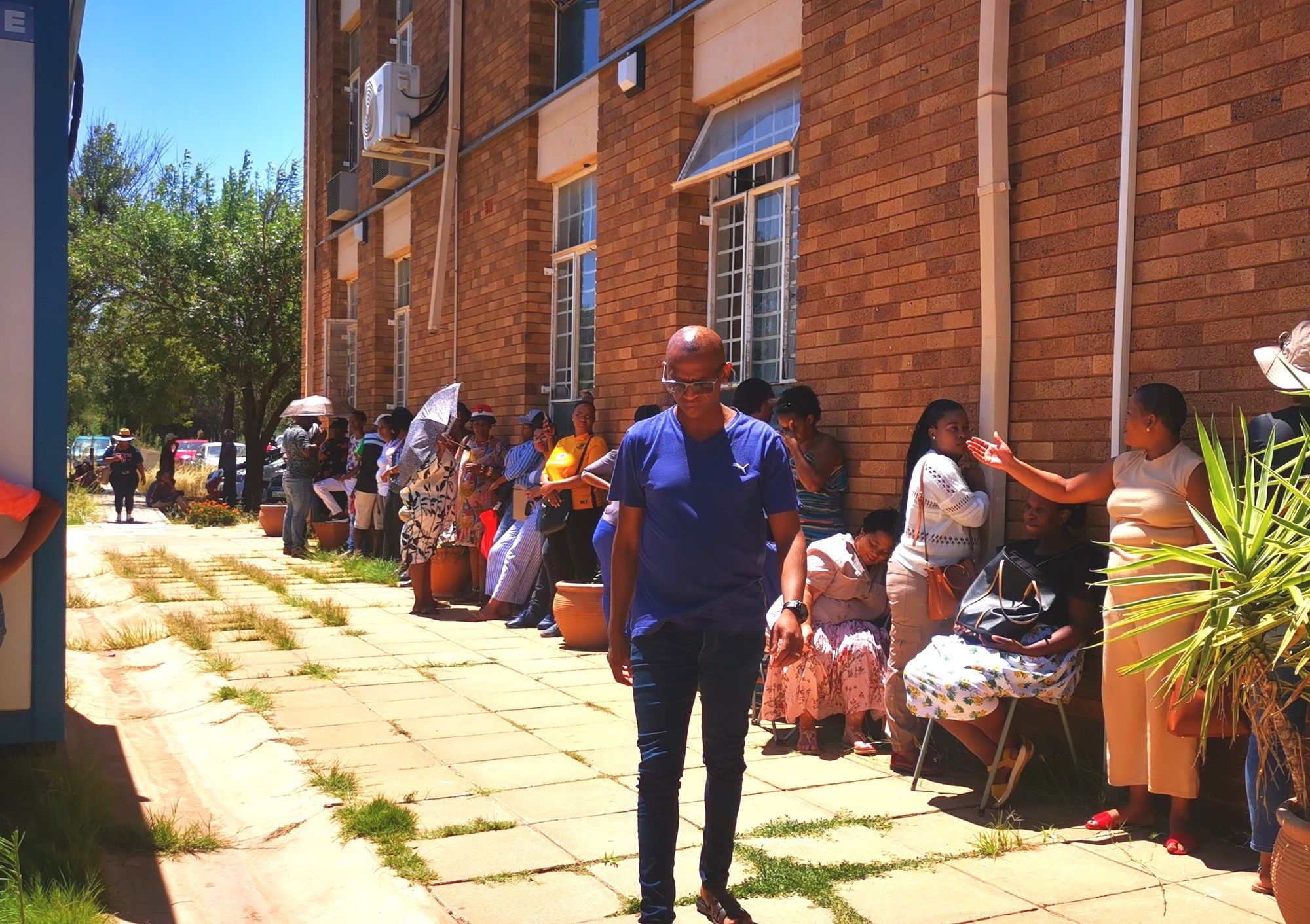 Frustrated parents queue for school places