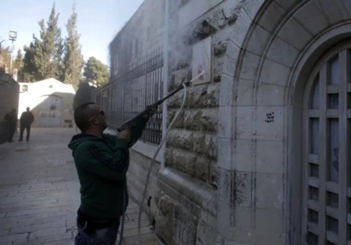 Teen held for anti-Christian graffiti