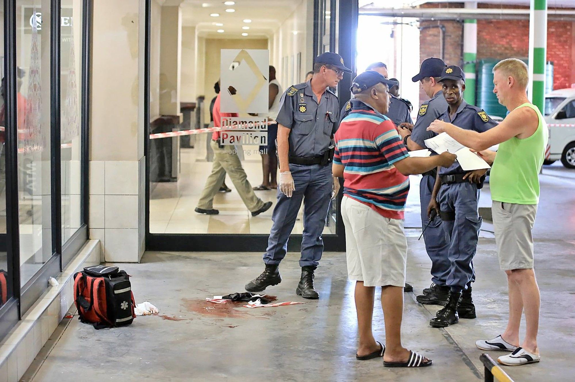 Mall guard shot in parking row